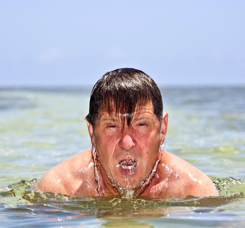 Portrait of a Man Swimming in the Ocean Stock Image - Image of hair ...