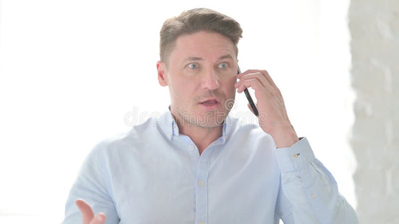 Portrait of Man Talking Angrily on Smartphone Stock Photo - Image of ...