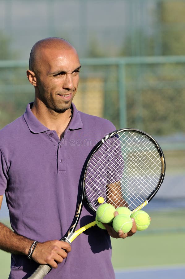 Portrait of a Man with Tennis Racket Stock Image - Image of asian, head ...