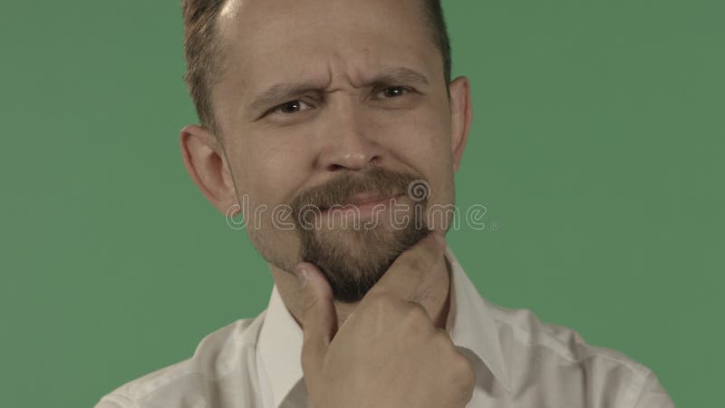 Portrait of a Man in Thought. an Idea Comes To Mind. Porter on Green ...