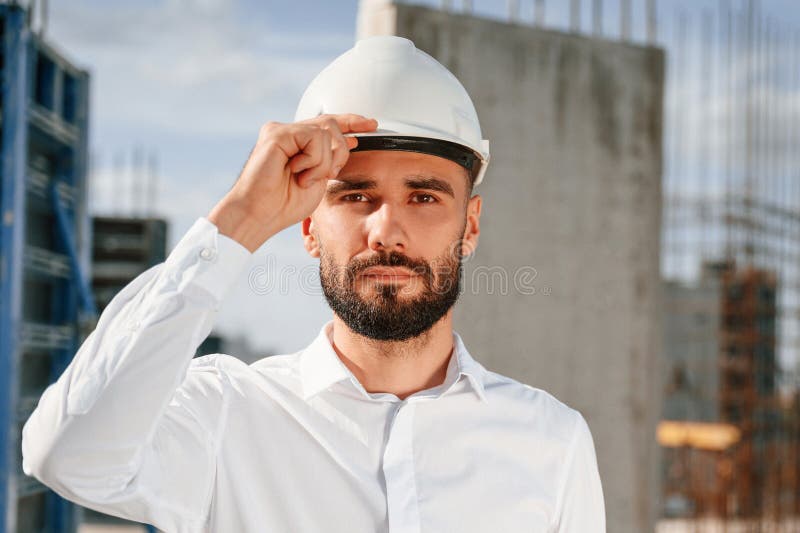 Portrait of Man that is in Uniform on the Construction Site Stock Photo ...