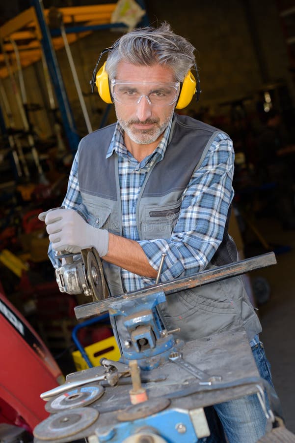 Portrait Man Using Angle Grinder Stock Photo - Image of metal ...