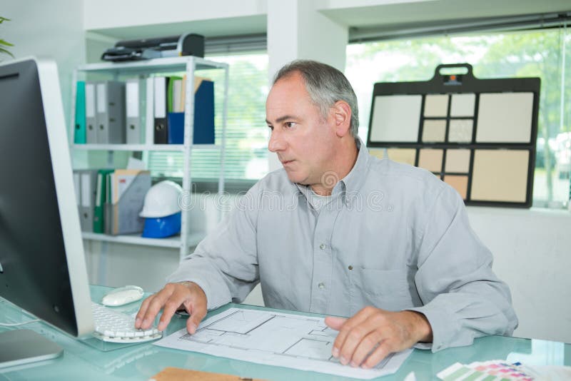 Portrait man at work stock image. Image of 45to49years - 174010759