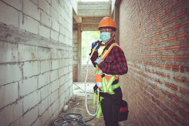 Portrait Man Worker in the Safety Uniform at Construction Site Stock ...