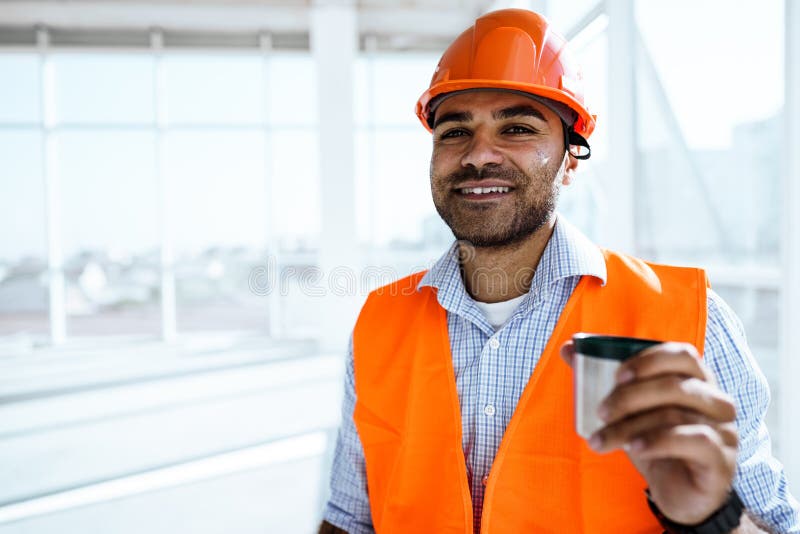 Portrait of a Man Worker in Workwear on a Break Drink Coffee and Have ...