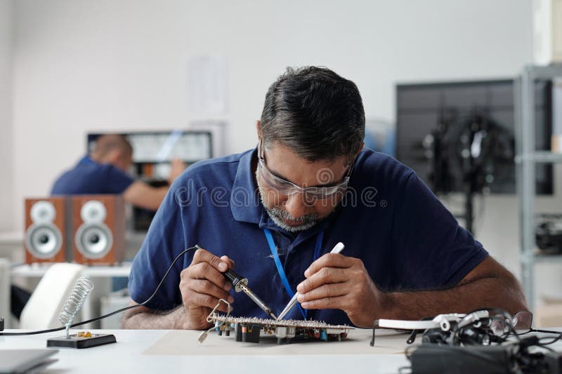 Portrait of Man Working with Electronic Components in Lab Stock Image ...