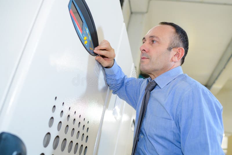 Portrait Man Working with Machine Stock Image - Image of control ...
