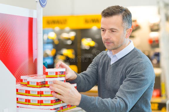 Portrait Man Working at Store Stock Image - Image of paint, control ...