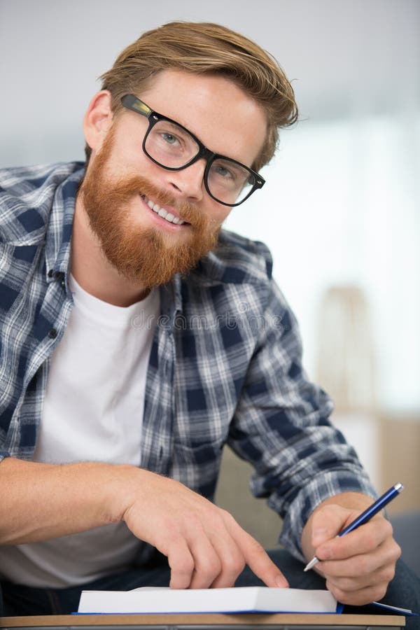 Portrait Man Writing in Notebook Stock Photo - Image of beard, portrait ...
