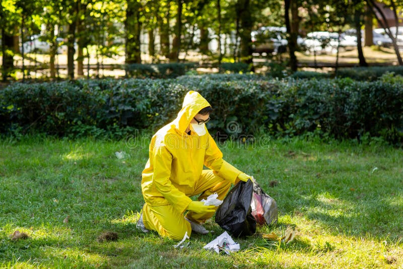 Portrait of a Man in a Yellow Protective Suit and Mask. the Man Sat ...