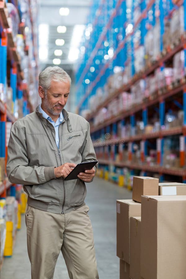 Portrait of Manager is Looking a Tablet and Smiling Stock Image - Image ...