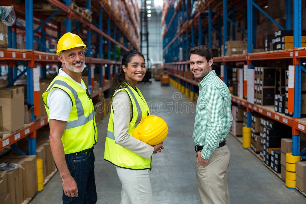 Portrait of Manager and Workers are Standing and Smiling To the Camera ...