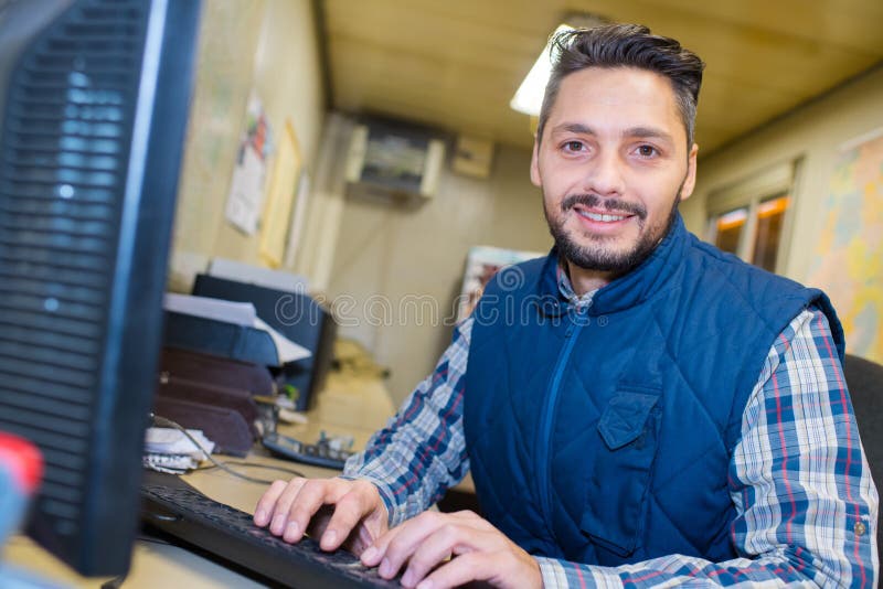 Portrait Manual Worker Typing at Computer Stock Image - Image of typing ...