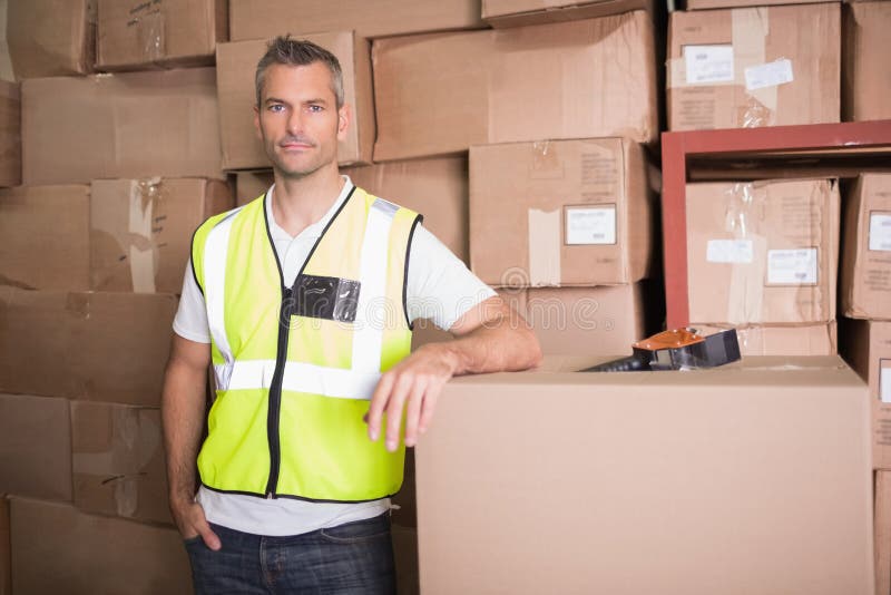 Portrait of Manual Worker in Warehouse Stock Image - Image of serious ...