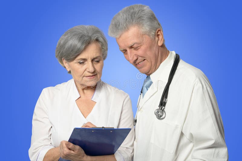 Mature doctors couple stock photo. Image of adult, medicine - 105444032