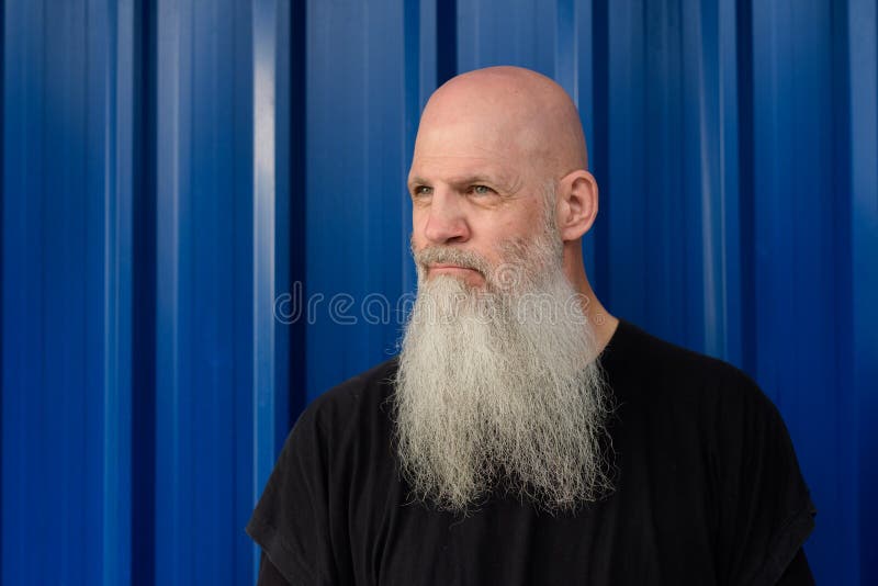 Face of Mature Handsome Bald Bearded Man Thinking Against Metal Sheet ... Face of Mature Handsome Bald Bearded Man Thinking Against Metal Sheet ...