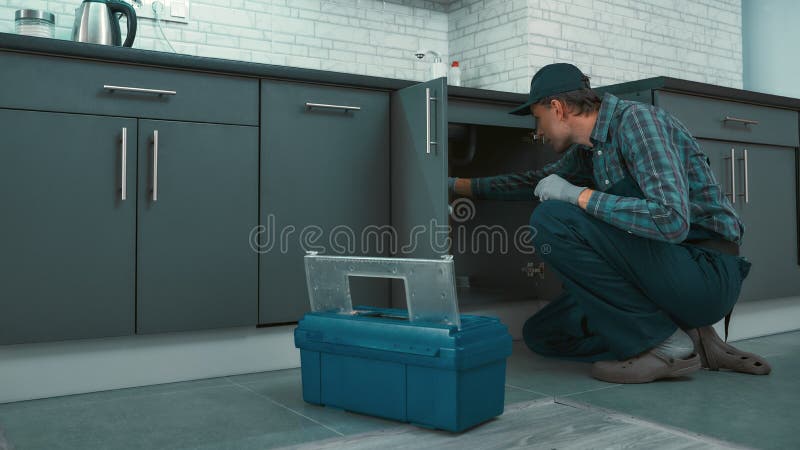 Let S Have a Look... Plumber Fixing Water Pipes Stock Image - Image of ... Let S Have a Look... Plumber Fixing Water Pipes Stock Image - Image of ...