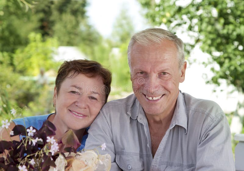 Happy Elderly Couple on Vacation Stock Image - Image of seniors, smile ...
