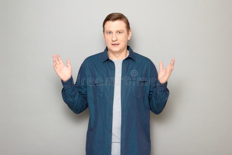 Portrait of Mature Man Talking and Explaining Something Stock Photo ...