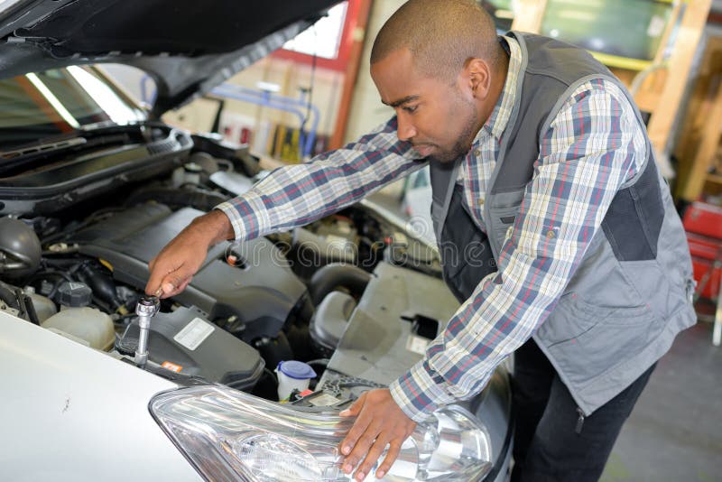 Portrait Mechanic Doing Vehicle Check-up Stock Image - Image of ...