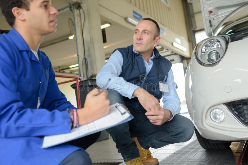 Portrait mechanic at work stock image. Image of cost - 103887123