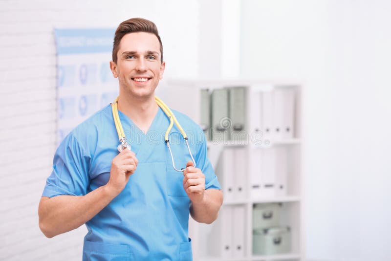 Portrait of Medical Assistant with Stethoscope in Hospital Stock Photo ...