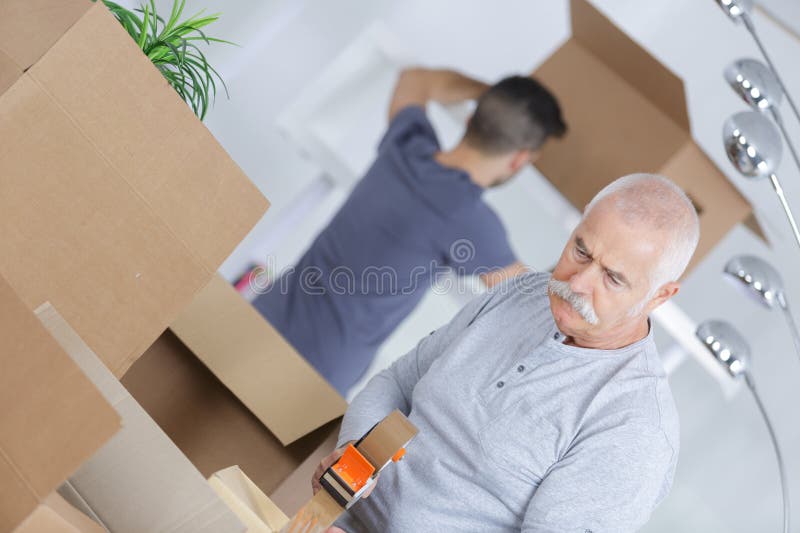 Portrait Men Packing Their Boxes Stock Photo - Image of agency, postage ...