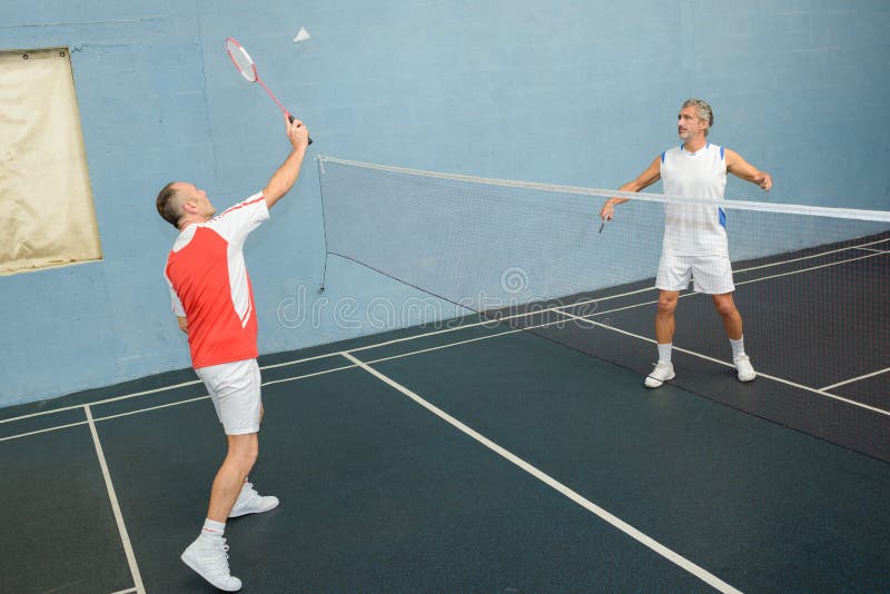 Portrait Men Playing Badminton Stock Photo - Image of shuttlecock ...
