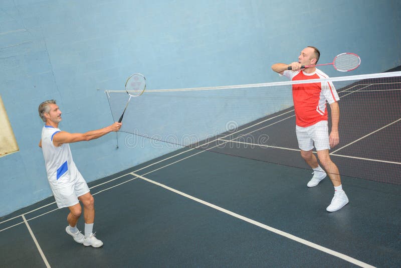Portrait Men Playing Badminton Stock Photo - Image of active, strike ...