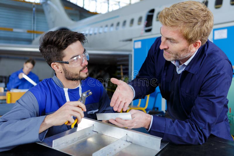 Portrait Men Working on Airplane Engine Stock Image - Image of plane ...