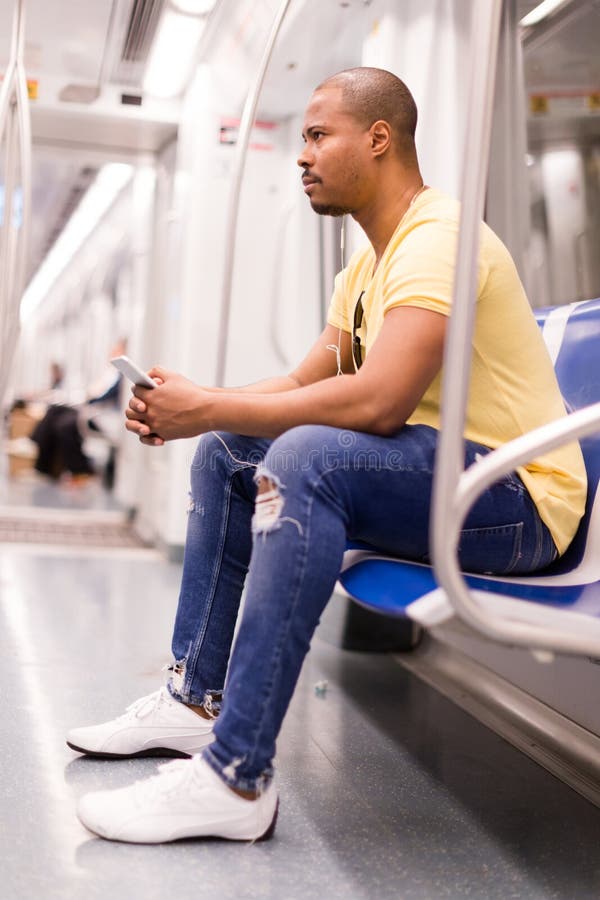 Metro Passenger Man Sitting in Car Seat and Using Phone Stock Image ...