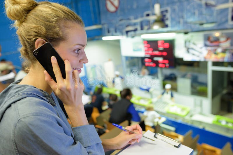 Portrait Mid Adult Using Cell Phone in Factory Stock Image - Image of ...