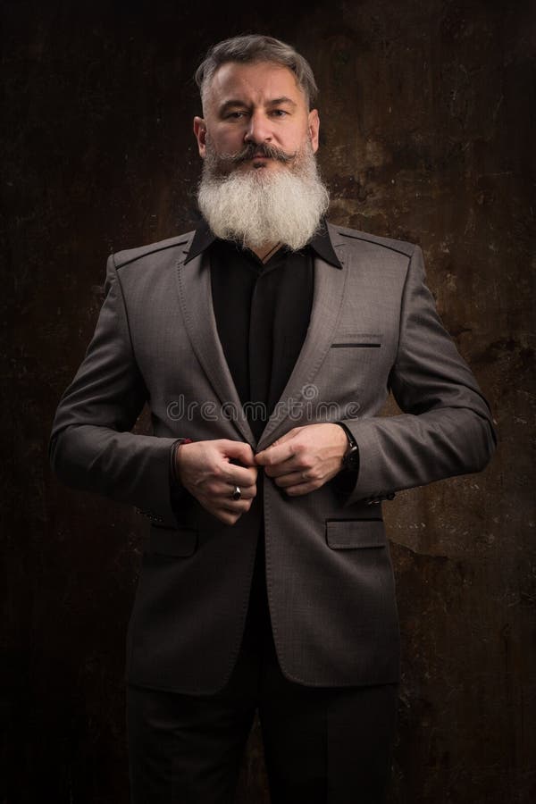 Portrait of a Middle Age Man with Beard and Mustache Posing in Formal ...