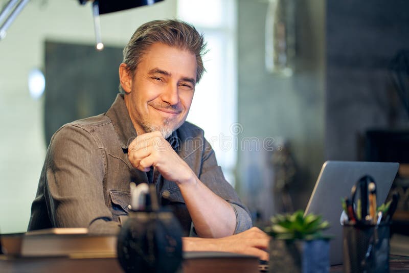 Portrait of Middle Aged Bearded Guy at Home. Older Handsome Man Smiling ... Portrait of Middle Aged Bearded Guy at Home. Older Handsome Man Smiling ...