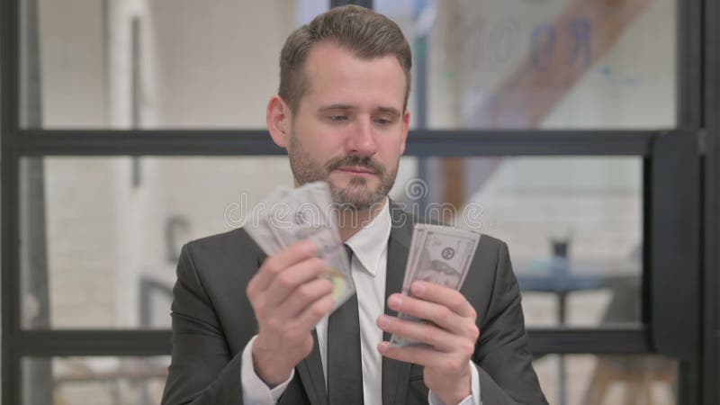 Portrait of Middle Aged Businessman Counting Money Stock Footage ...