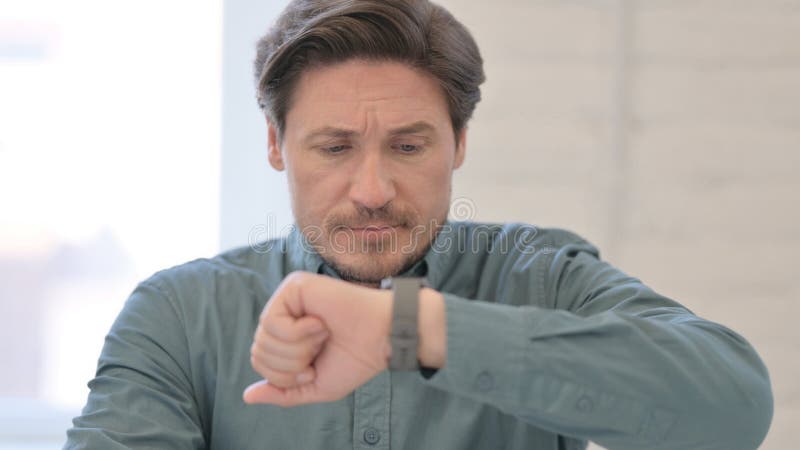 Portrait of Middle Aged Man Checking Watch, Waiting Stock Image - Image ...