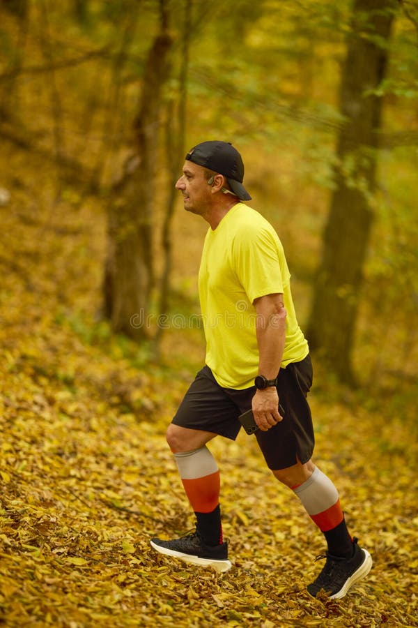 Portrait of a Middle-aged Man Running in the Park Stock Image - Image ...