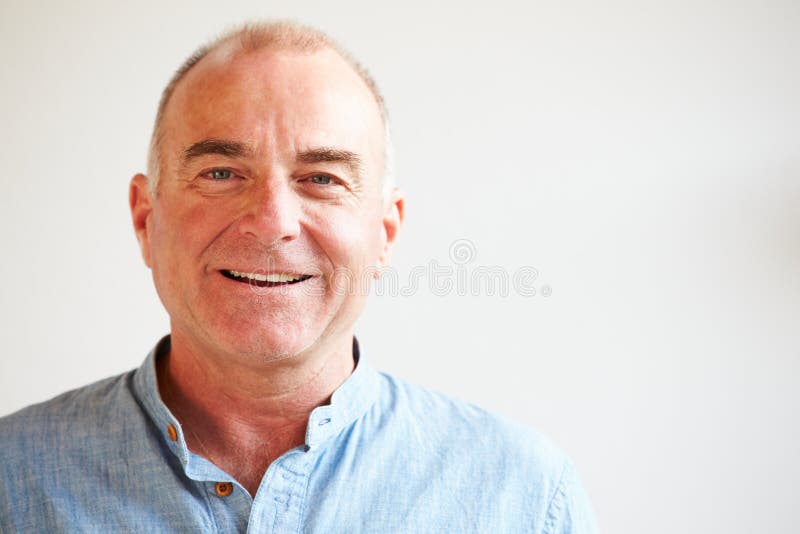 Portrait of Middle Aged Man Standing by Wall Stock Image - Image of ...