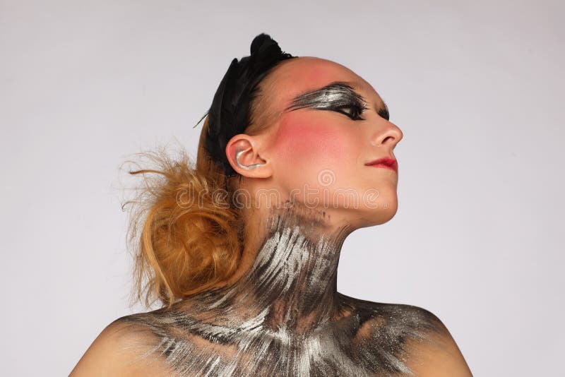 Portrait Of A Model In Creative Expressive Style. Studio Photo Session ...