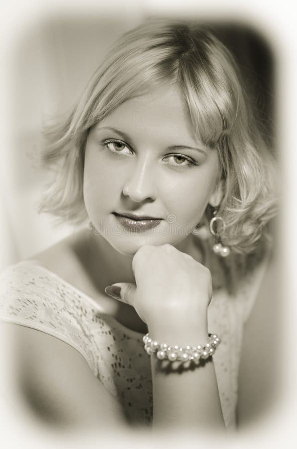Conceptual Portrait Of A Young Seductive Emotional Beautiful Blonde