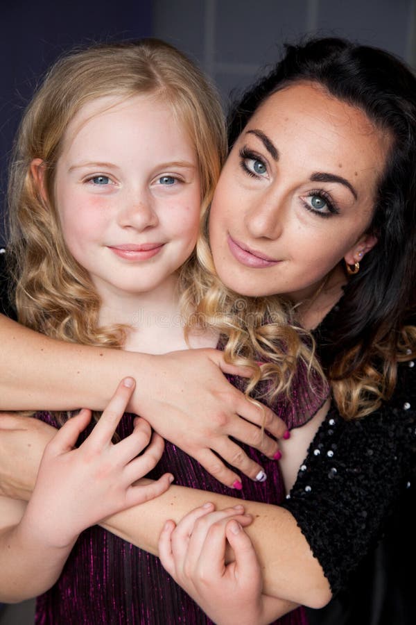 Portrait of a Beautiful Mom and Daughter of 10 Years Stock Image ...