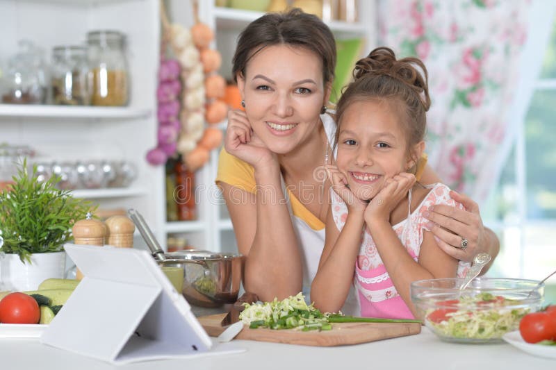 Portrait of Mother and Daughter Cooking Together Stock Image - Image of ...