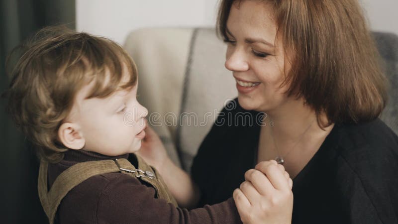 Portrait Of A Mother Gently Hugging Her Son Stock Footage Video Of