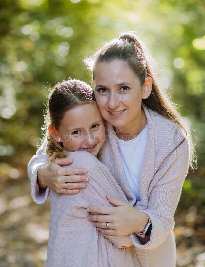 Portrait of Mother with Her Daughter in Forest. Stock Photo - Image of ...