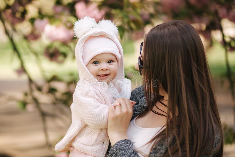 Portrait of Mother and Her Little Baby Girl. Beautiful Mom and Cute ... Portrait of Mother and Her Little Baby Girl. Beautiful Mom and Cute ...