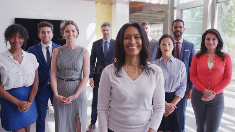 Portrait of Multi-Cultural Business Team Standing in Modern Open Plan ...