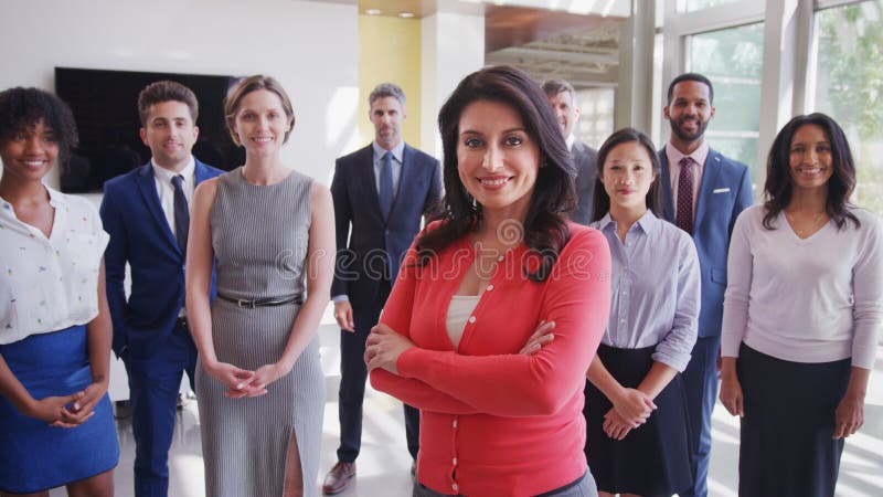 Portrait of Multi-Cultural Business Team Standing in Modern Open Plan ...