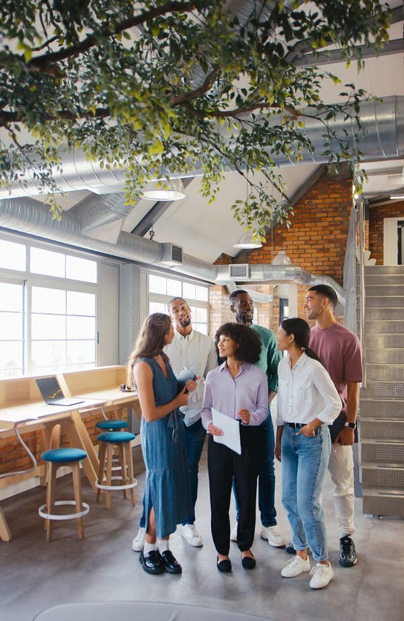 Portrait of Multi-Cultural Business Team Standing in Modern Open Plan ...