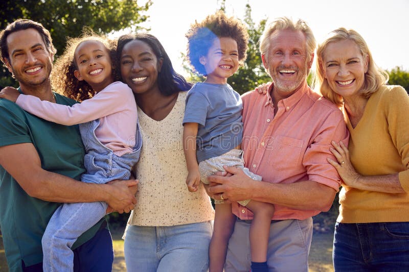 Portrait of Multi-Generation Family at Home in Garden Together Stock ...
