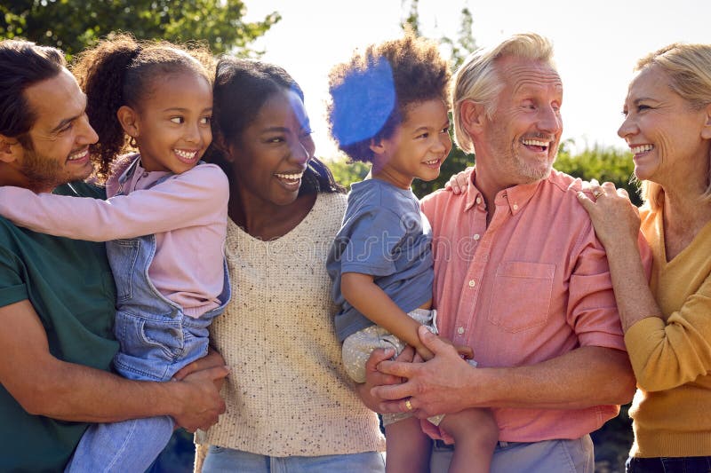 Portrait of Multi-Generation Family at Home in Garden Together Stock ...